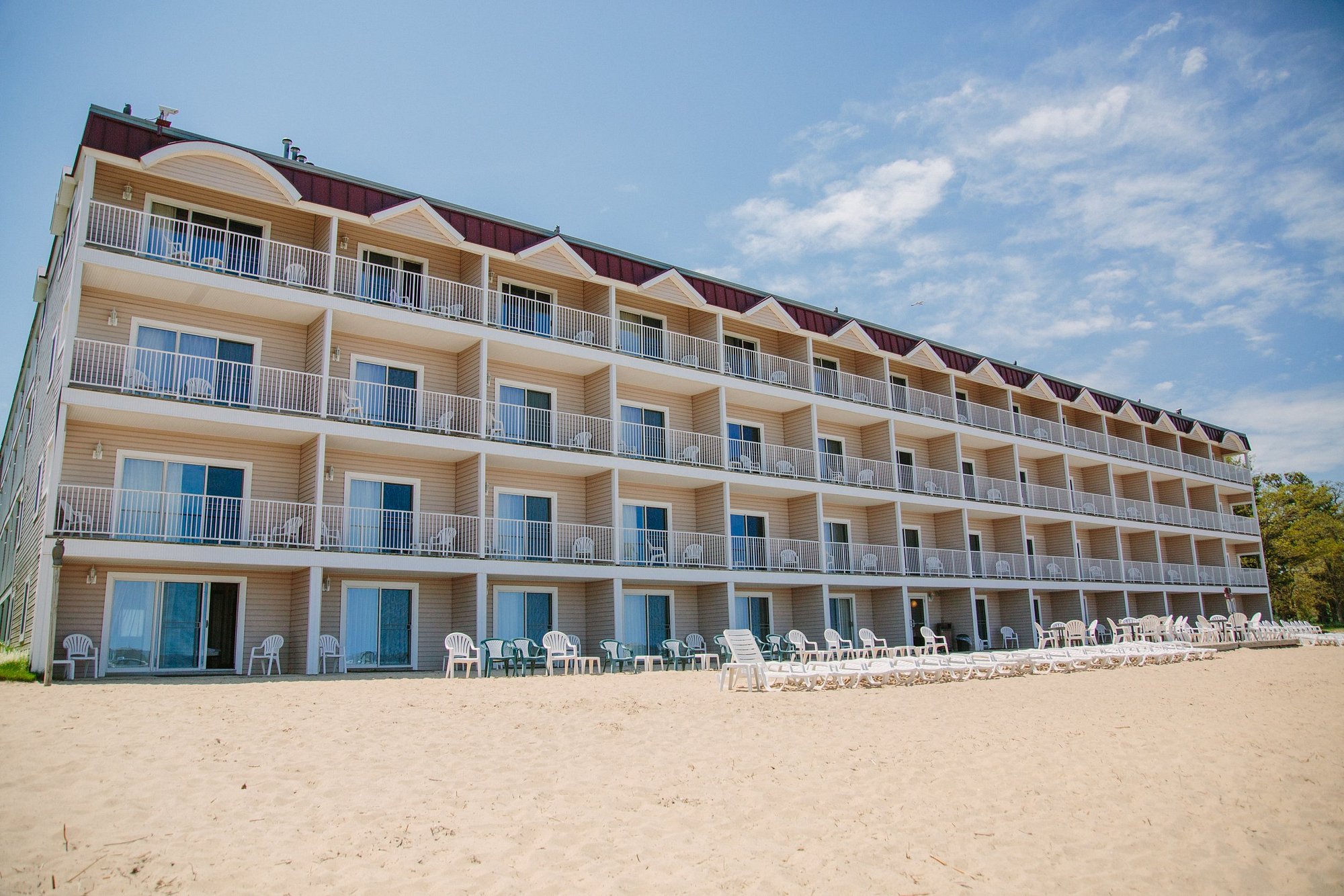 The 7 Best Beach Resorts in Michigan | Right on the Beachfront & Sand